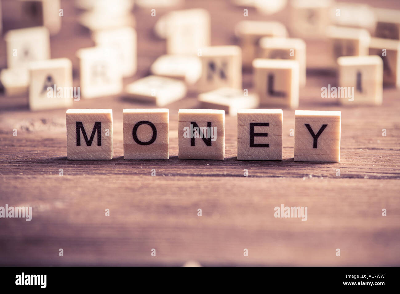 wooden elements with letter collected word money Stock Photo - Alamy
