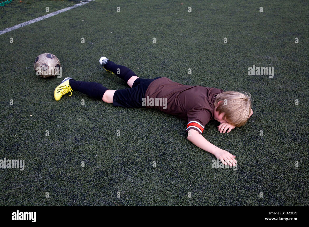 young after football game Stock Photo - Alamy
