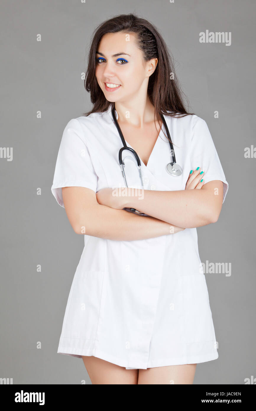 Portrait of a friendly female doctor. happy young smiling female doctor ...
