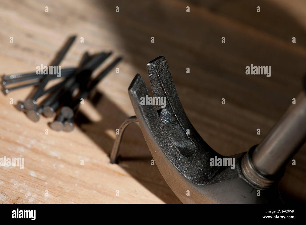 Hammer nail pull hi-res stock photography and images - Alamy