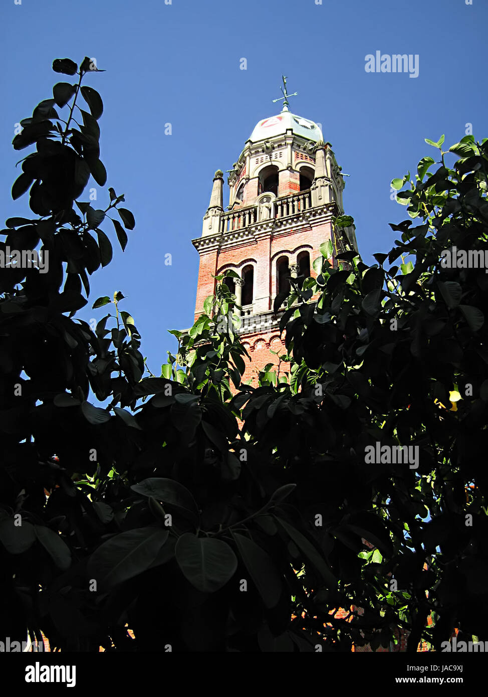 A photograph of a church bell tower detailing its unique architectural ...