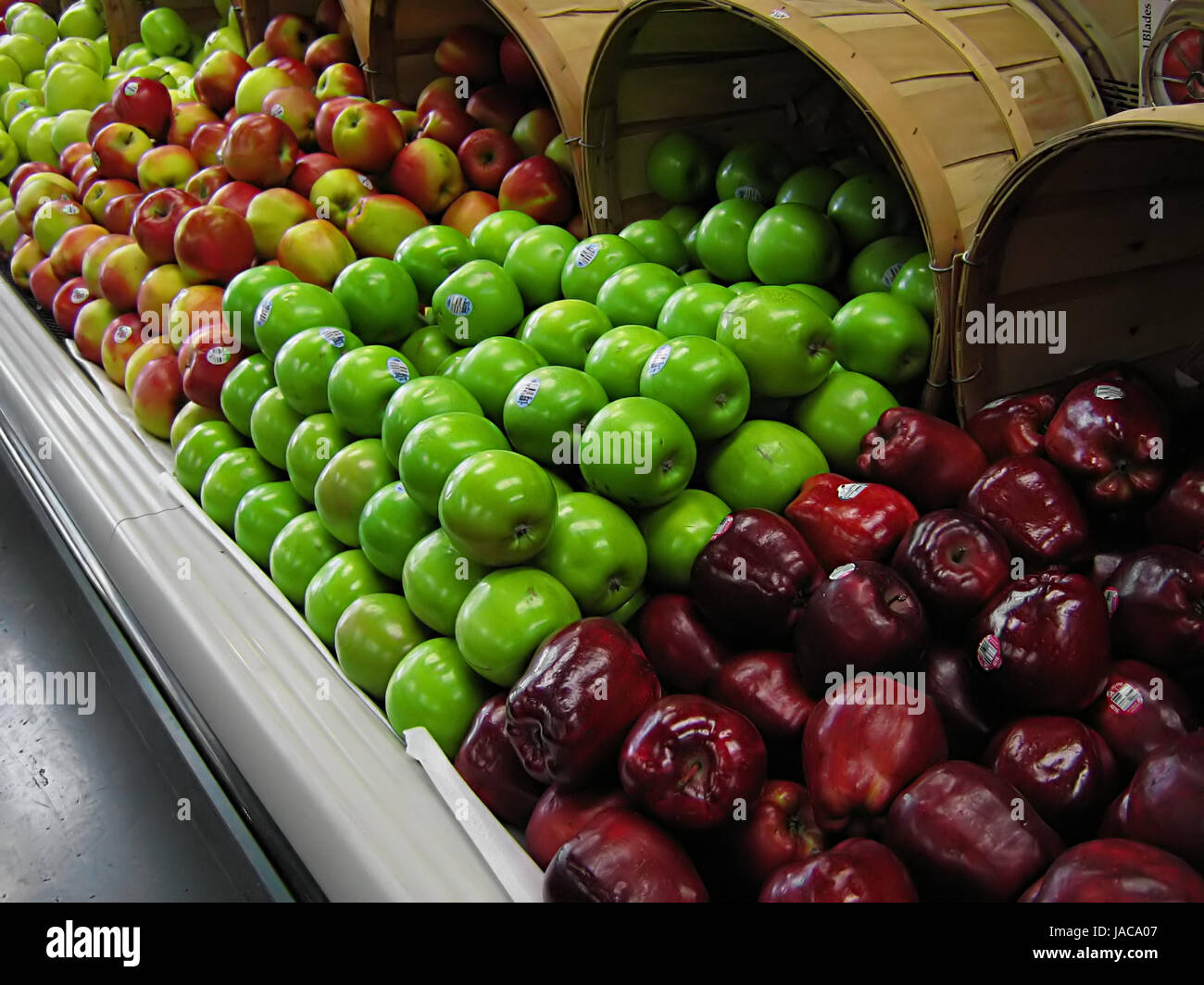 A photograph of various apples for sale in a grocery store Stock Photo ...