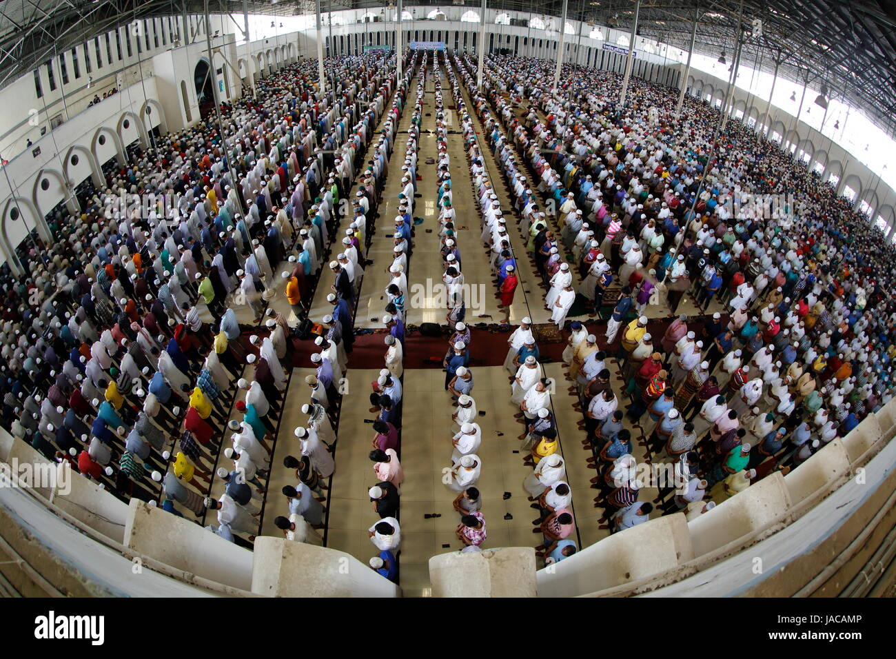 Devotees offer the Jummah prayers at the Baitul Mukarram National ...
