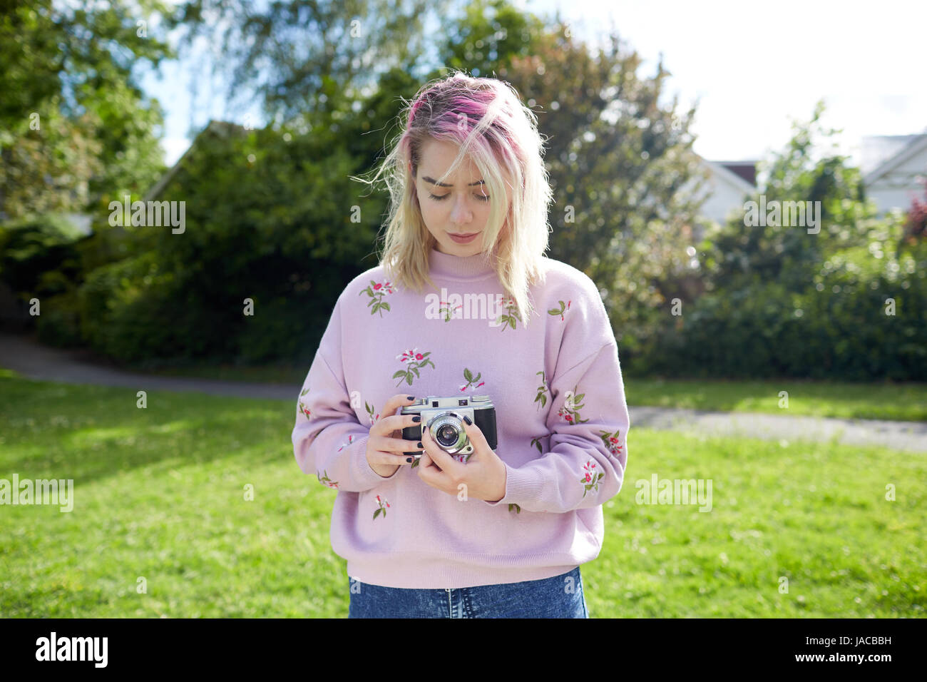 Film camera generation z girl hi-res stock photography and images - Alamy