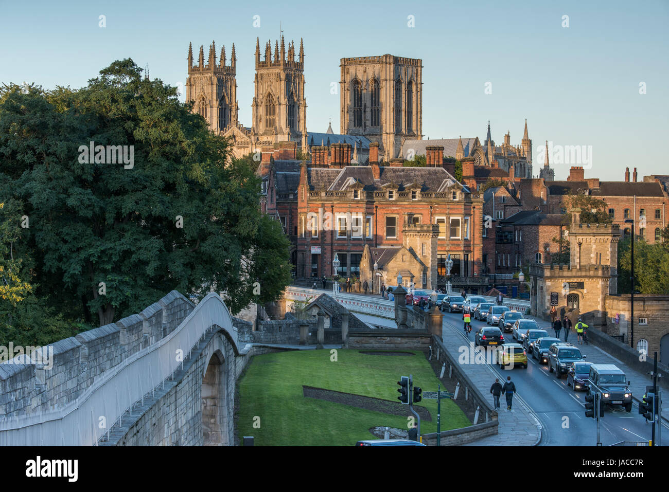 Scenic York cityscape - historic walls view (sunlit Minster towers ...
