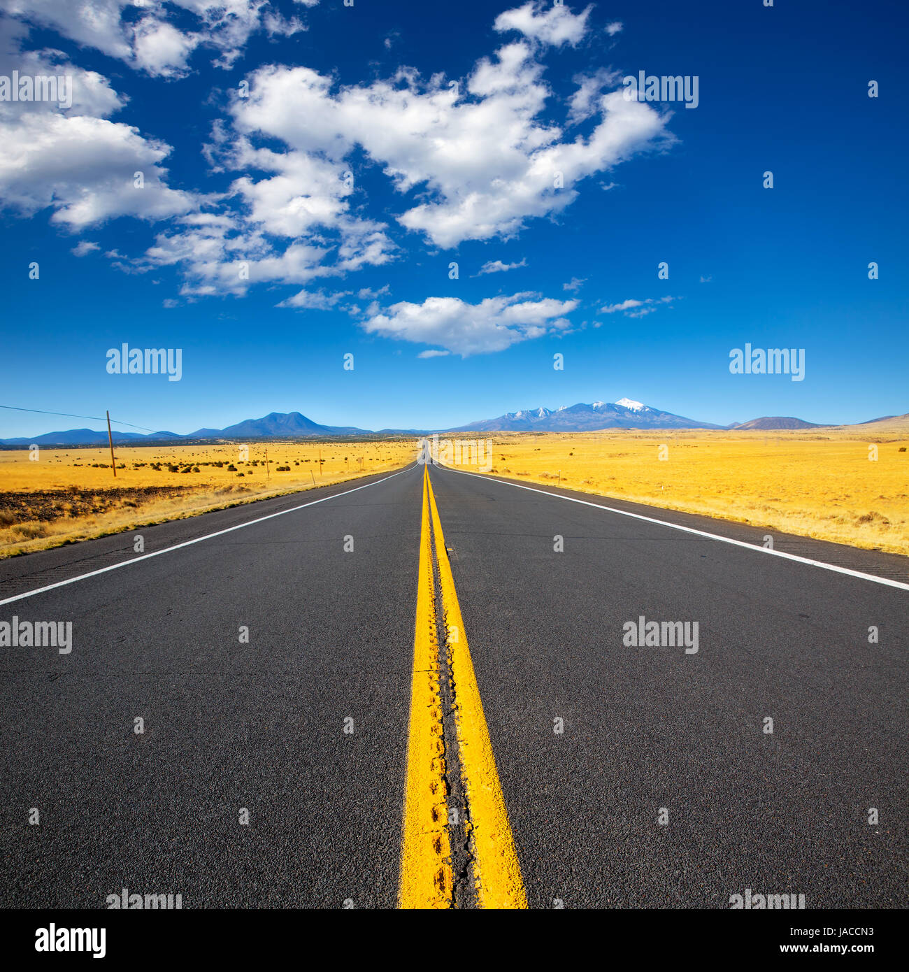 Arizona Highway 89 US with view of snowed mountains in Humphreys peak ...