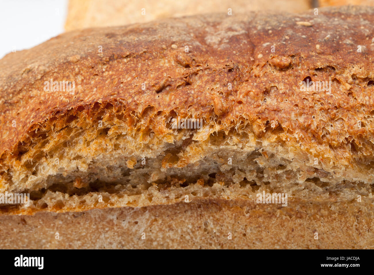 loaves of bread traditionally roasted. Background. Close up Stock Photo ...