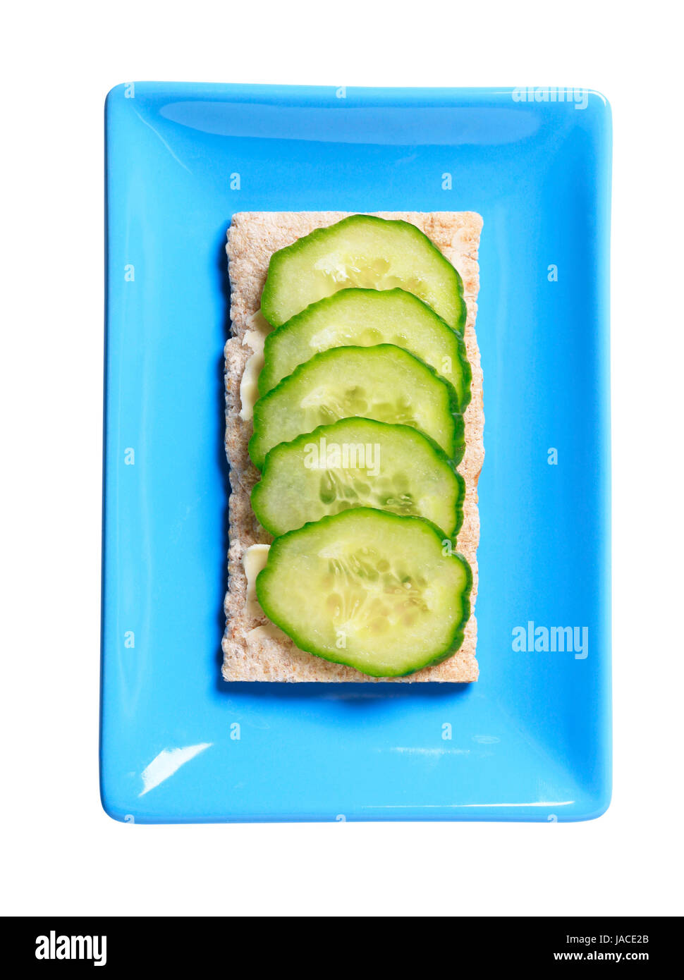 Crisp bread with slices of fresh cucumber Stock Photo - Alamy