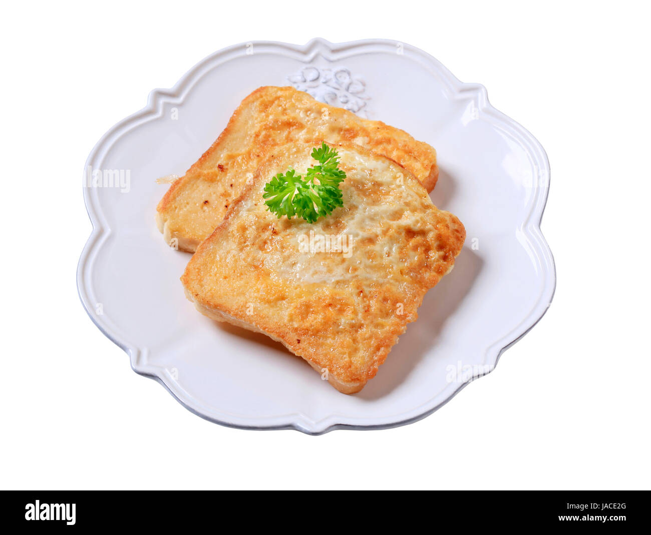 Two pieces of French toast on plate Stock Photo - Alamy