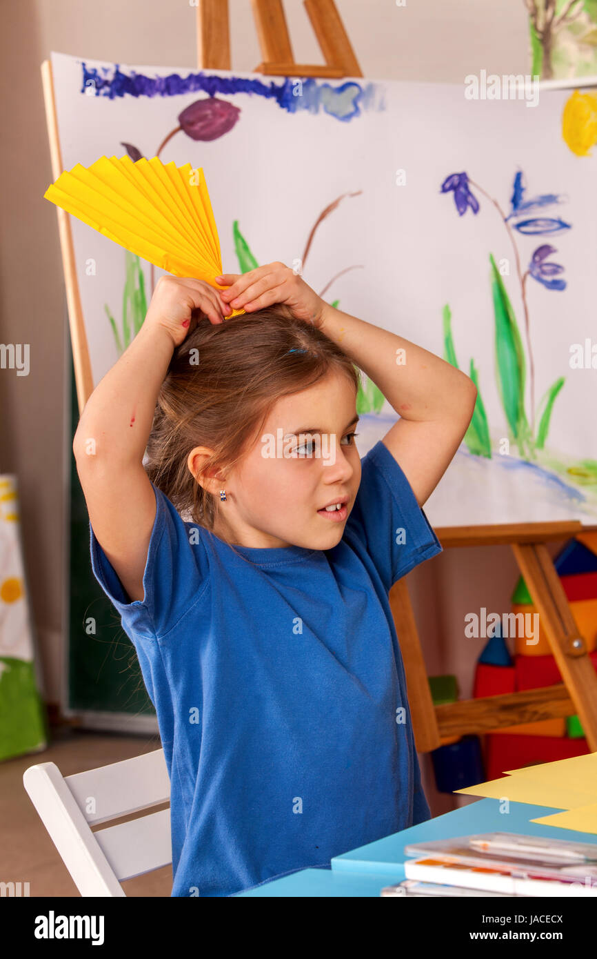 Children cutting paper in class hi-res stock photography and images - Alamy