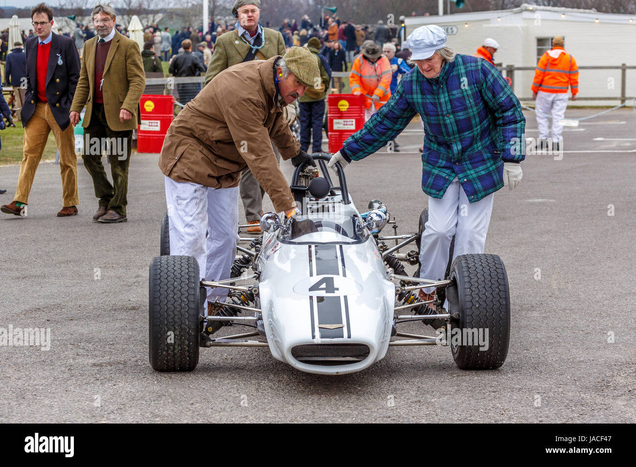 1969 Chevron-Ford B15C is pushed through the paddock before the Derek ...