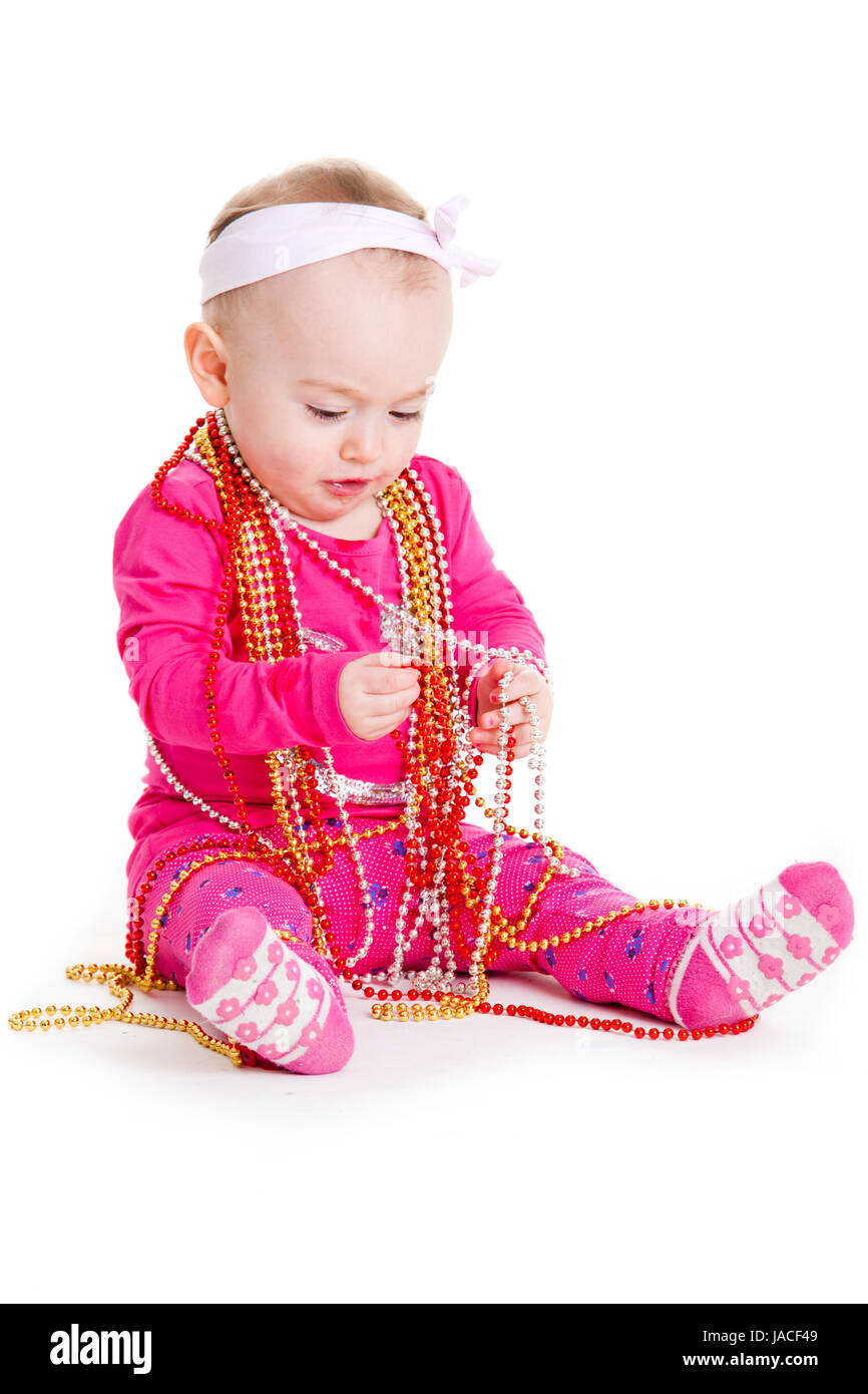 baby girl playing with beads. beautiful baby girl. Happy Baby Girl ...