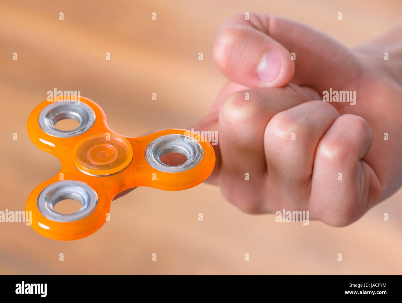 Hand with spinner toy Stock Photo - Alamy