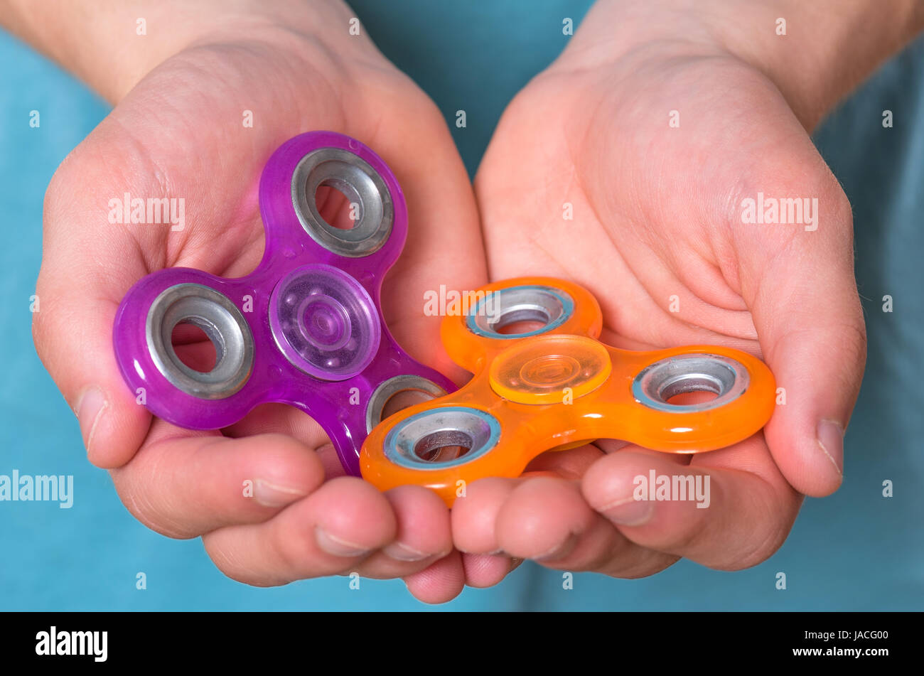 Hand with spinner toy Stock Photo - Alamy