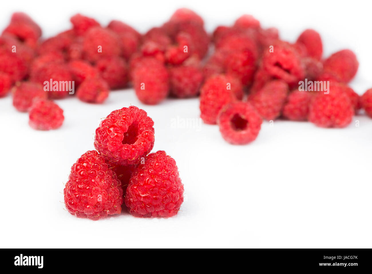 Raspberries white isolated studio shot Stock Photo - Alamy