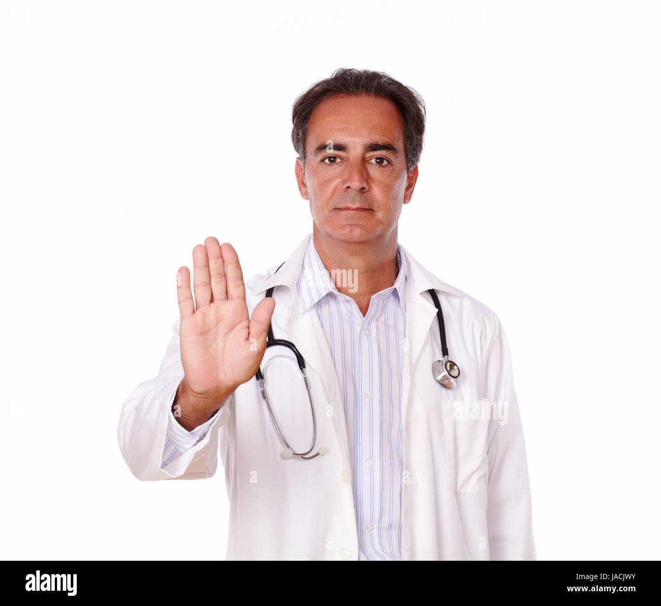 A portrait of an adult hispanic doctor on formal uniform standing with ...