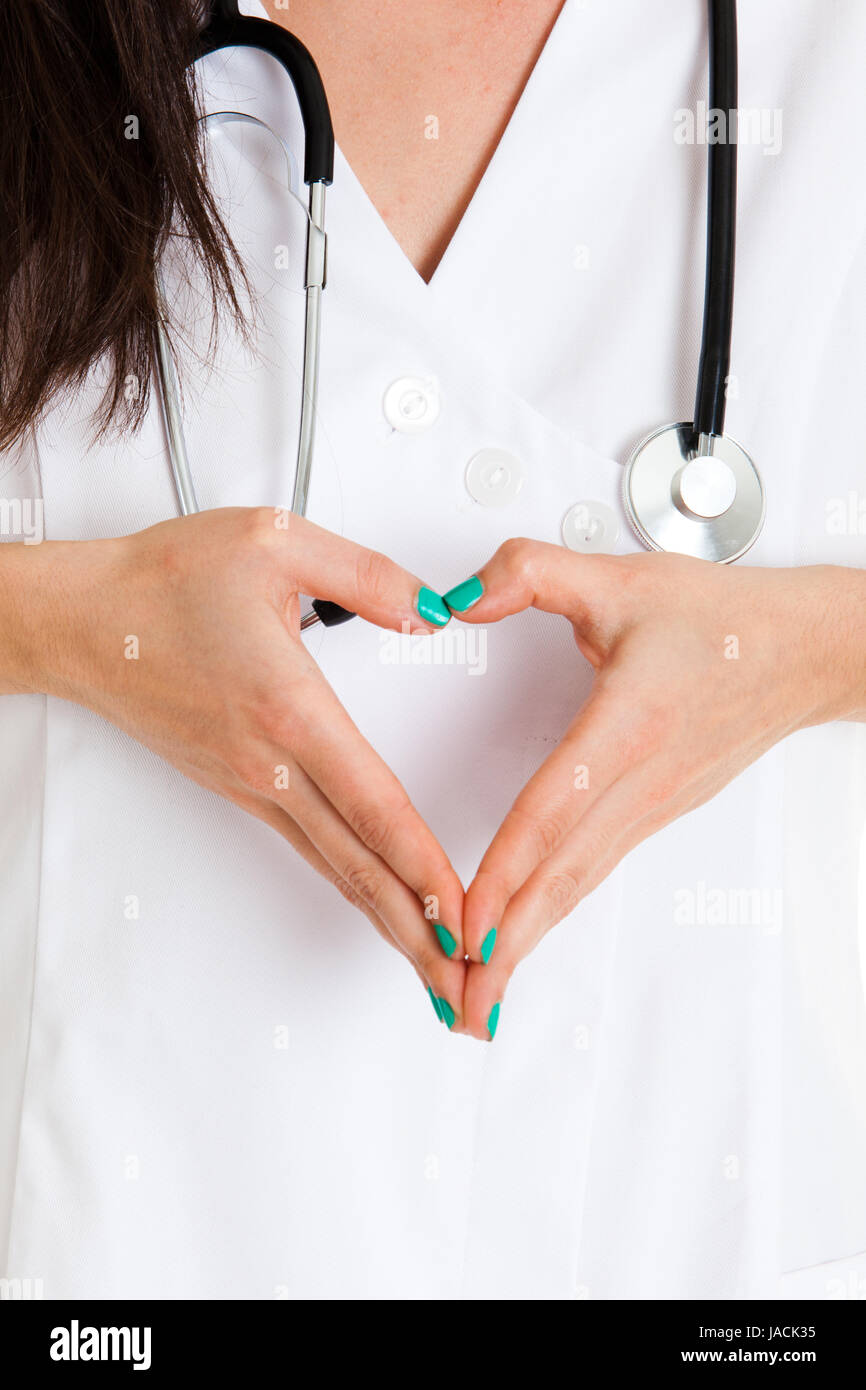 Doctor's hands making heart shape isolated on white background. Female ...