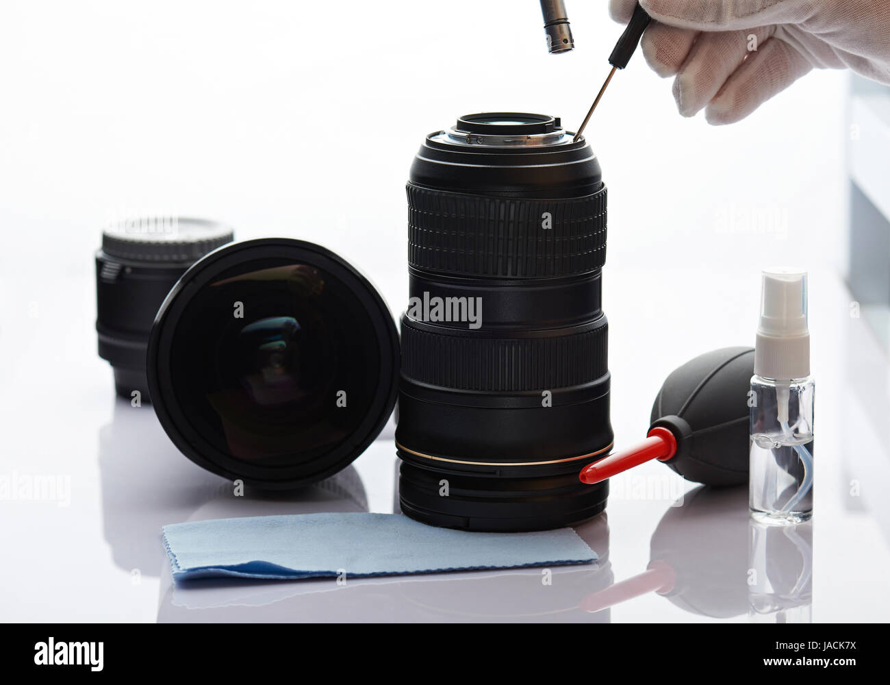 Professional repair optic service white desk. Closeup of maintanance ...