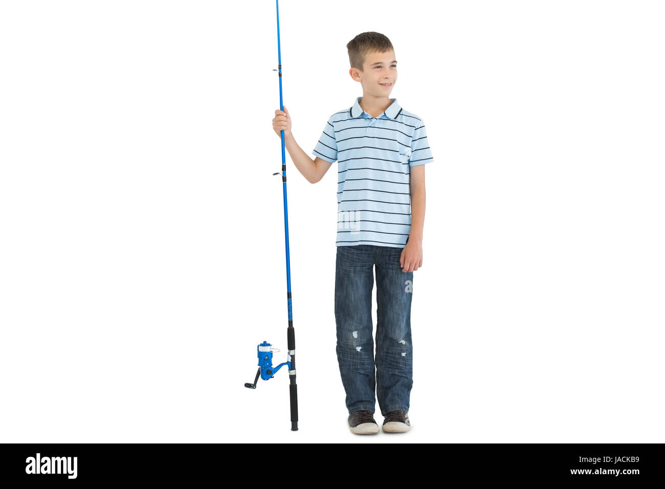 Pensive young boy holding fishing rod posing on white background Stock ...