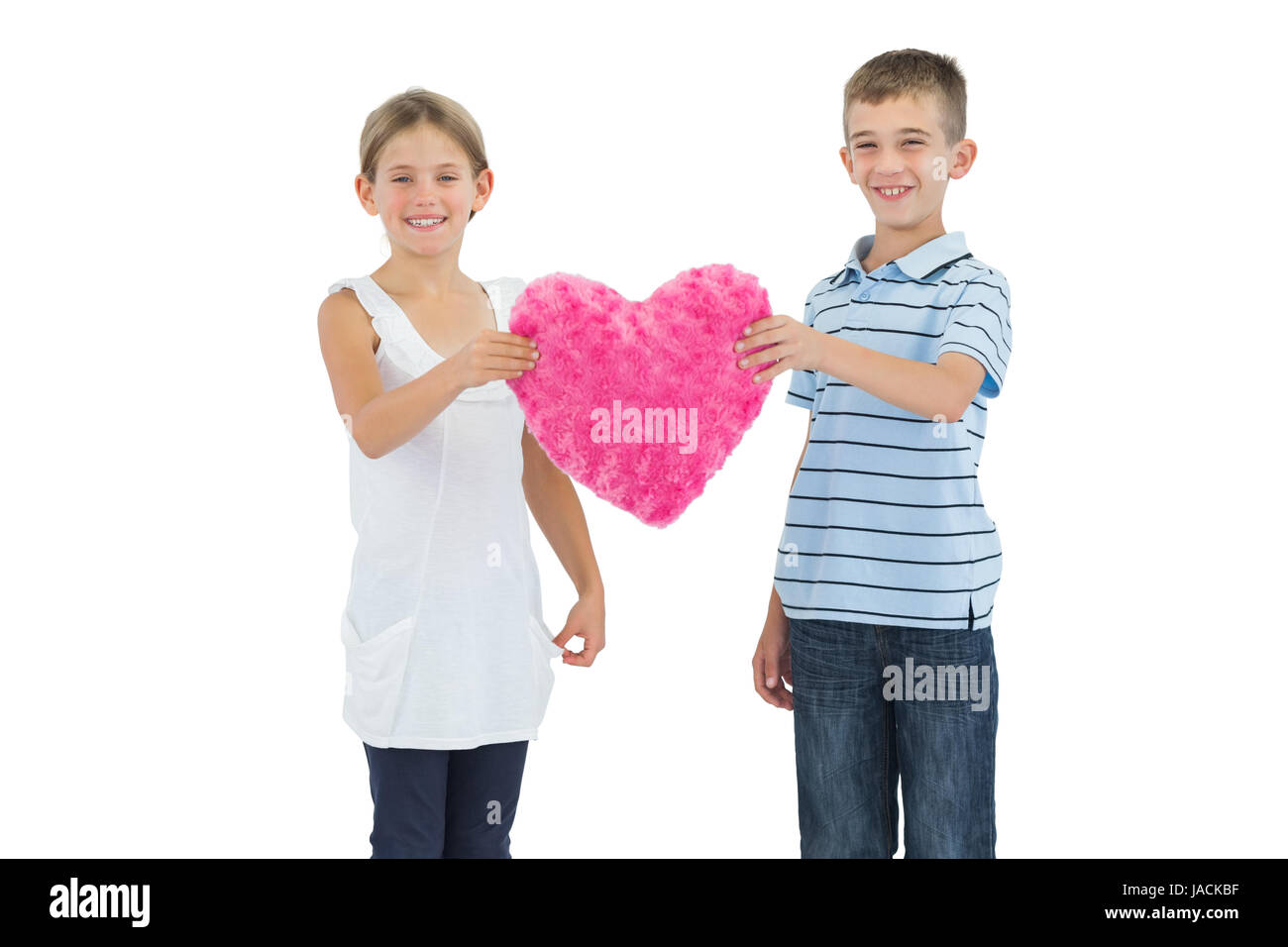 Smiling children holding heart soft hi-res stock photography and images ...