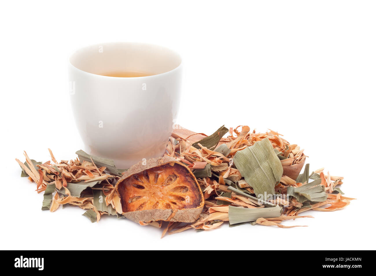 A cup of Thai herbal tea with mix of dried lemongrass, pandanas and ...