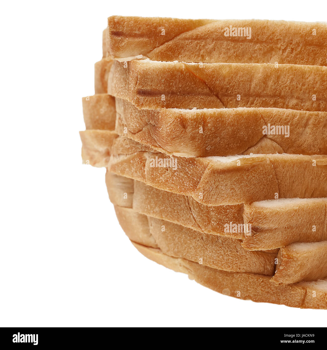 Brown stack of sliced bread on white background Stock Photo - Alamy