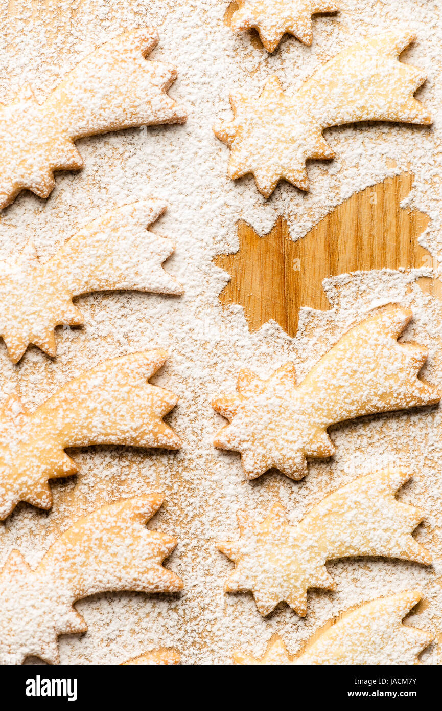 Christmas sweets comet star with powdered sugar Stock Photo - Alamy
