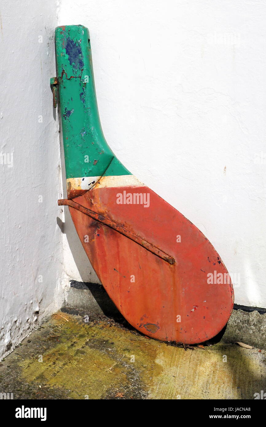 An old rudder from a fishing boat or rawler, being used as a decorative ...
