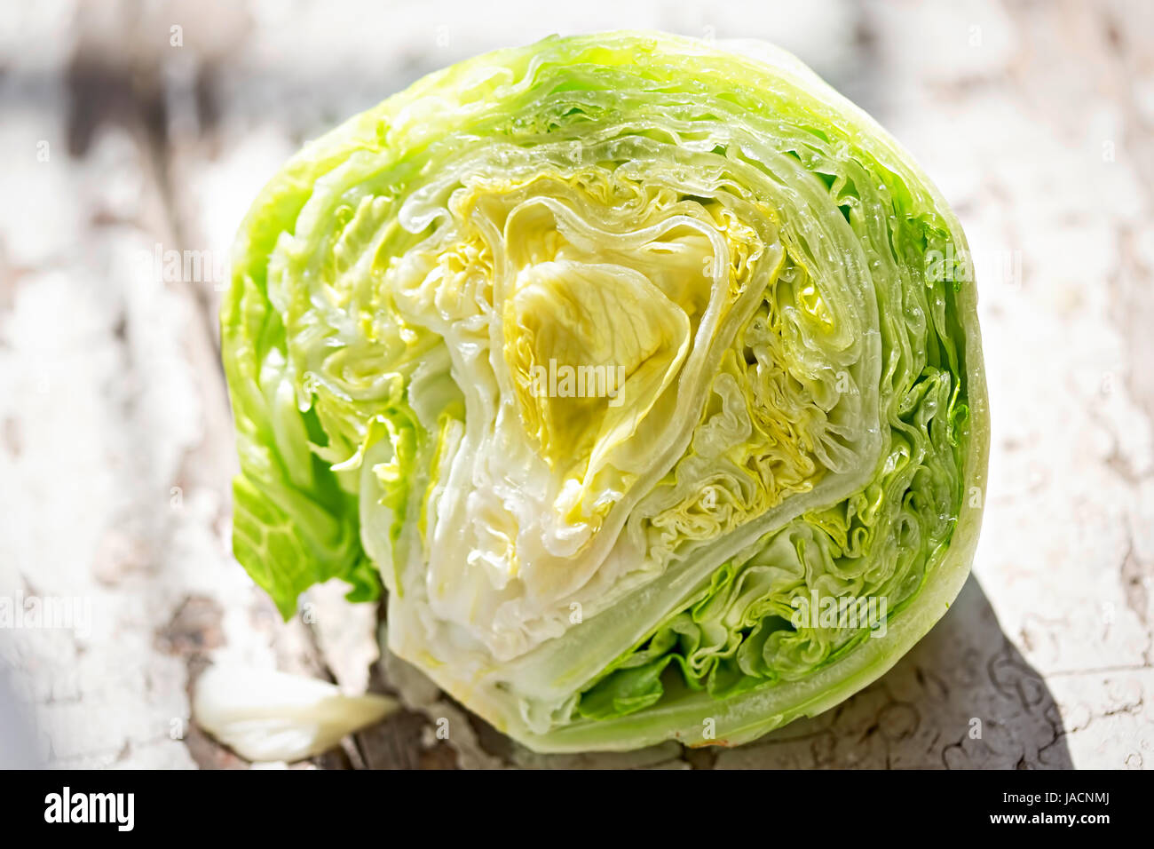 Iceberg lettuce half Stock Photo - Alamy