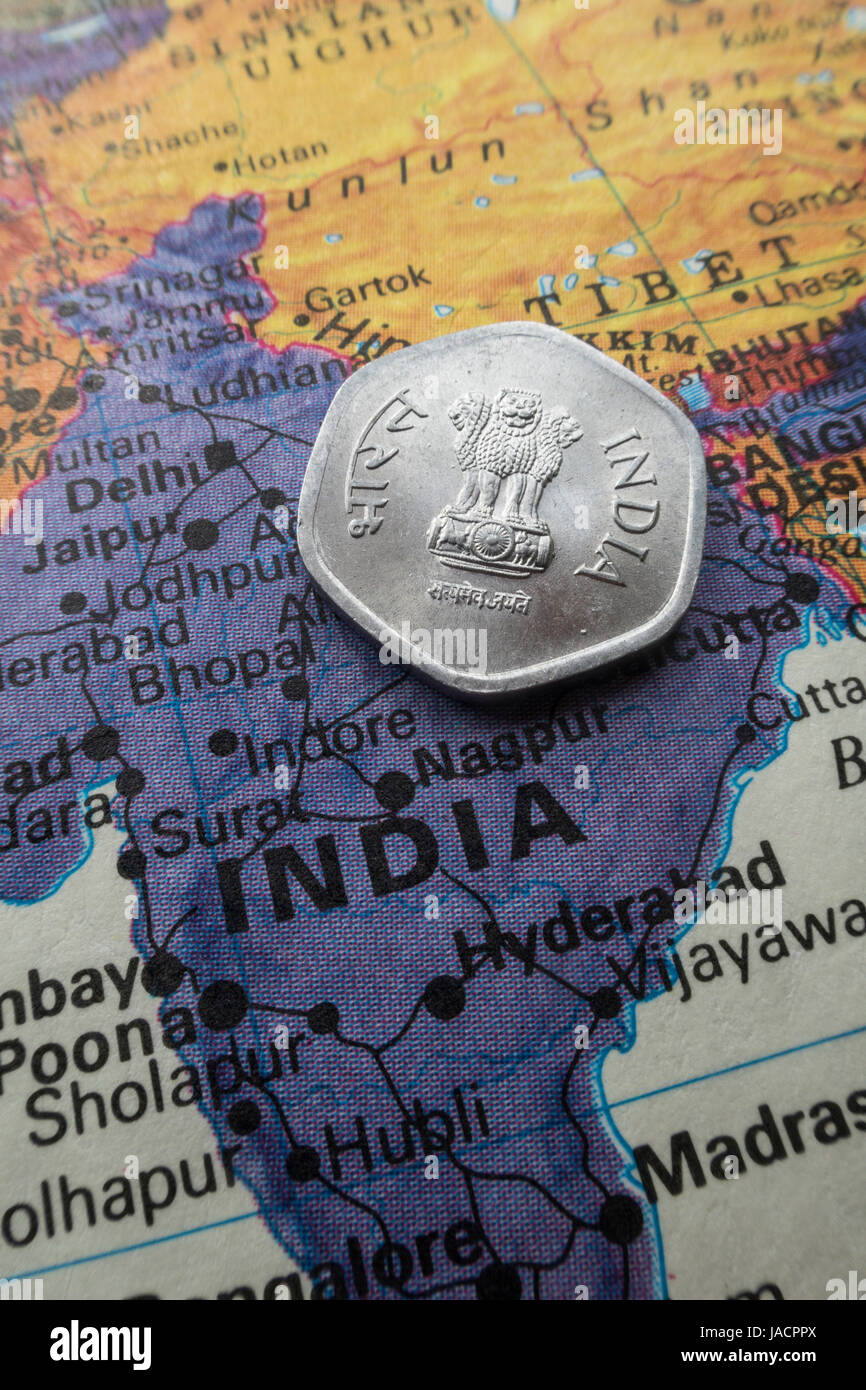 Indian Rupee Coin on World Map Still Life Stock Photo - Alamy