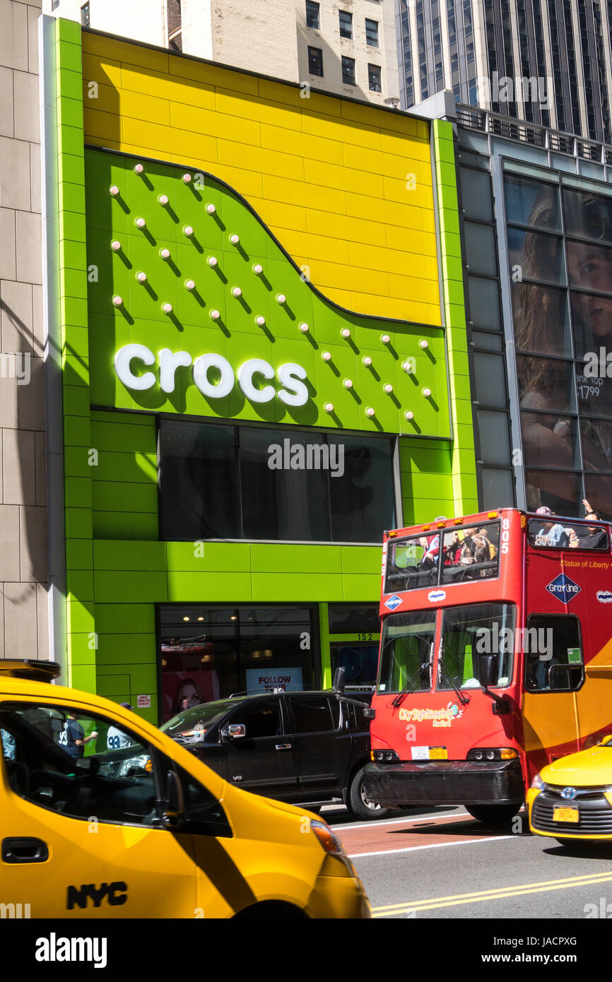 Crocs Storefront and Double-decker tour bus, NYC, USA 2017 Stock Photo ...