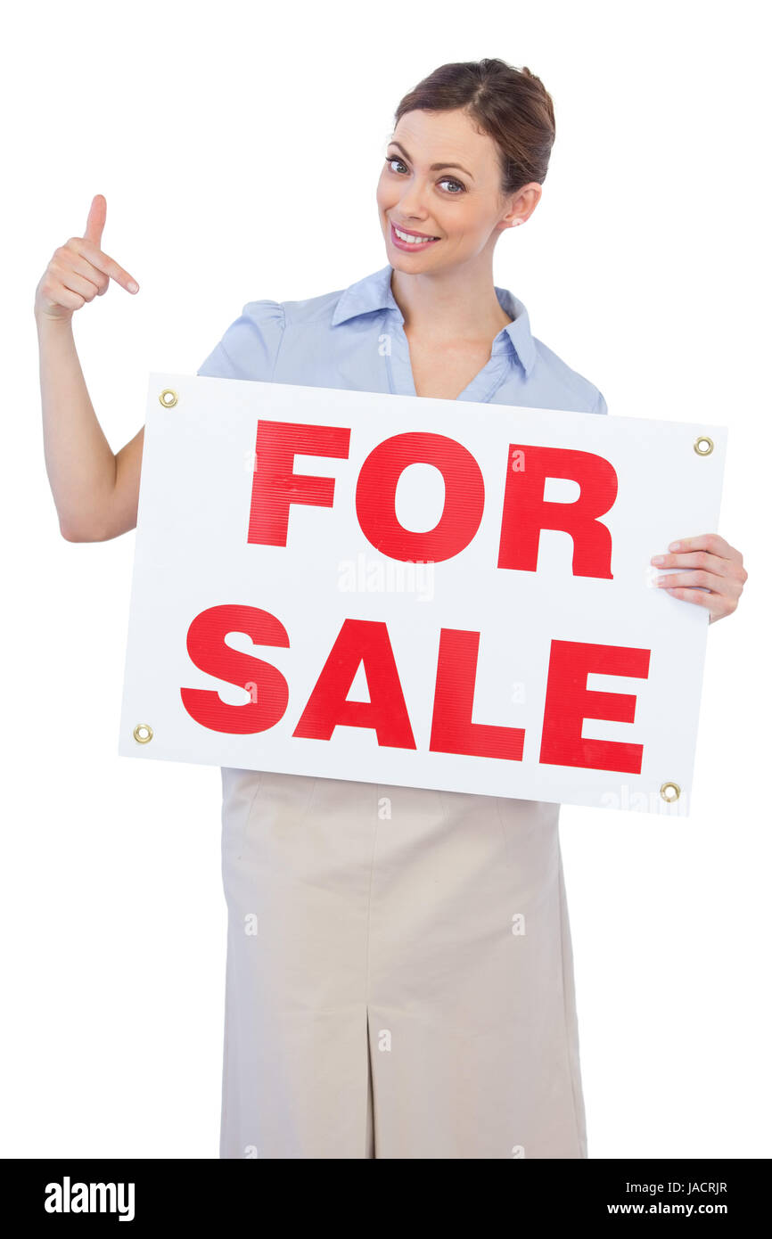 Happy estate agent posing sale hi-res stock photography and images - Alamy