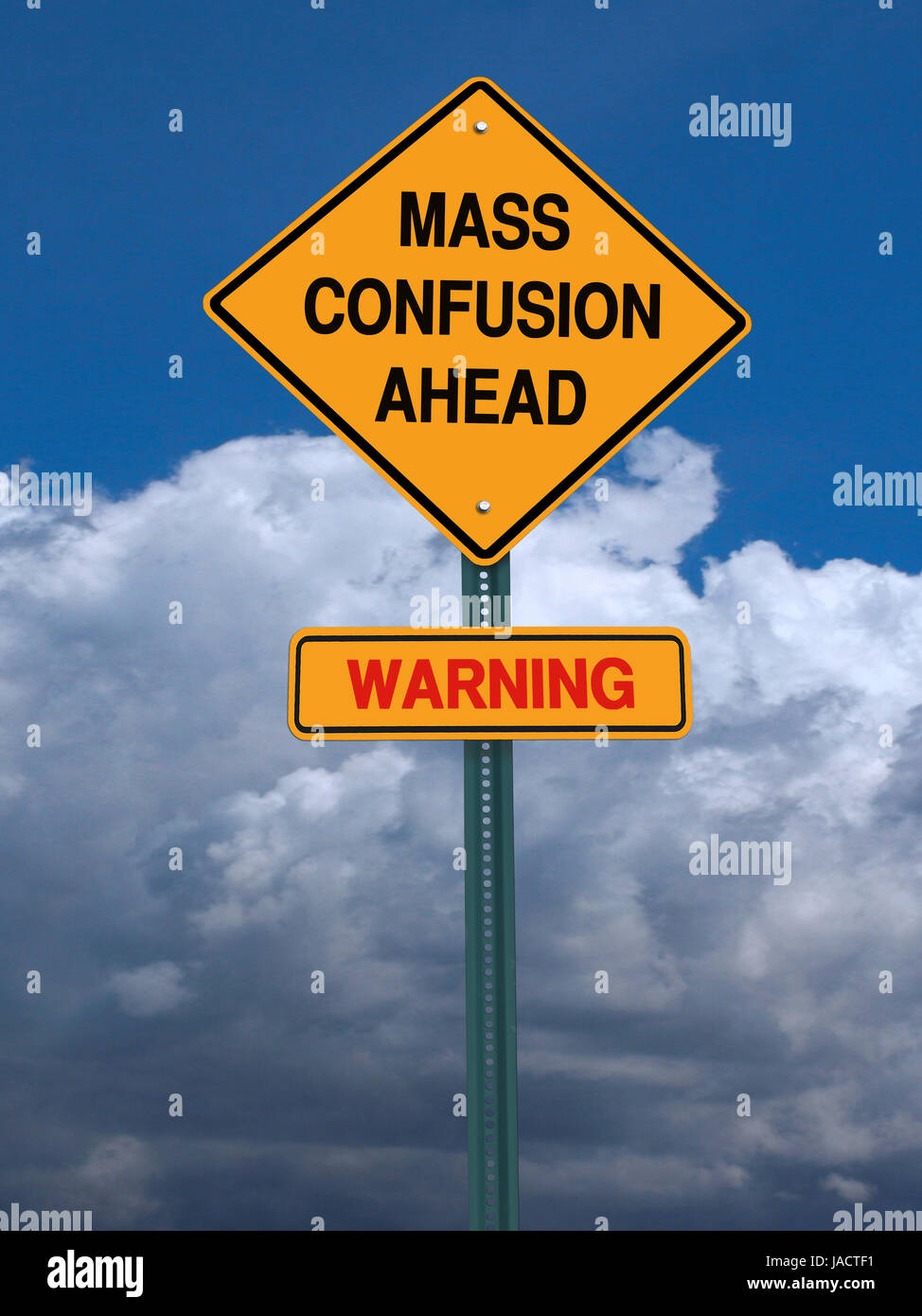 conceptual sign mass confusion ahead and danger warning over blue sky ...