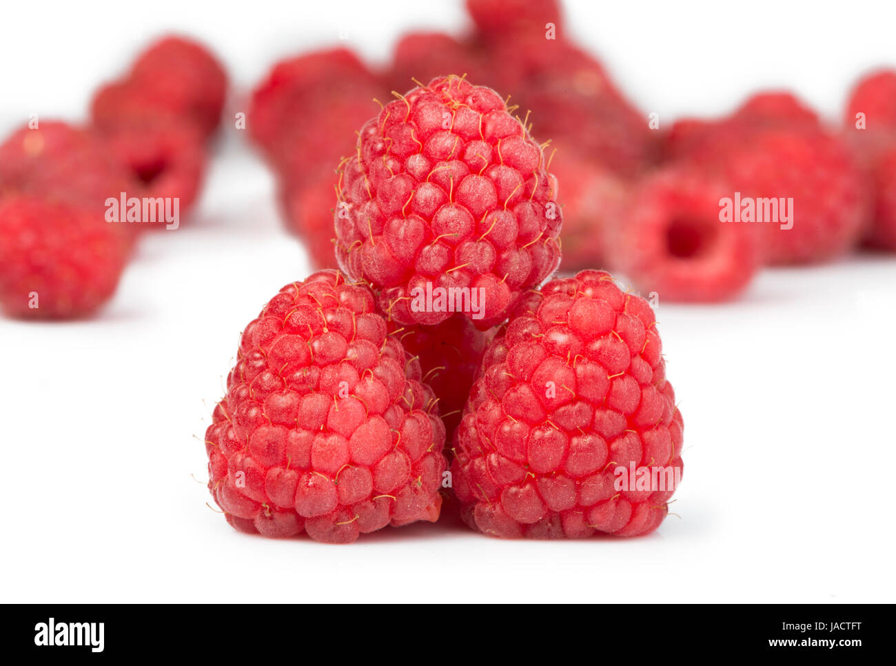 Raspberries white isolated studio shot Stock Photo - Alamy