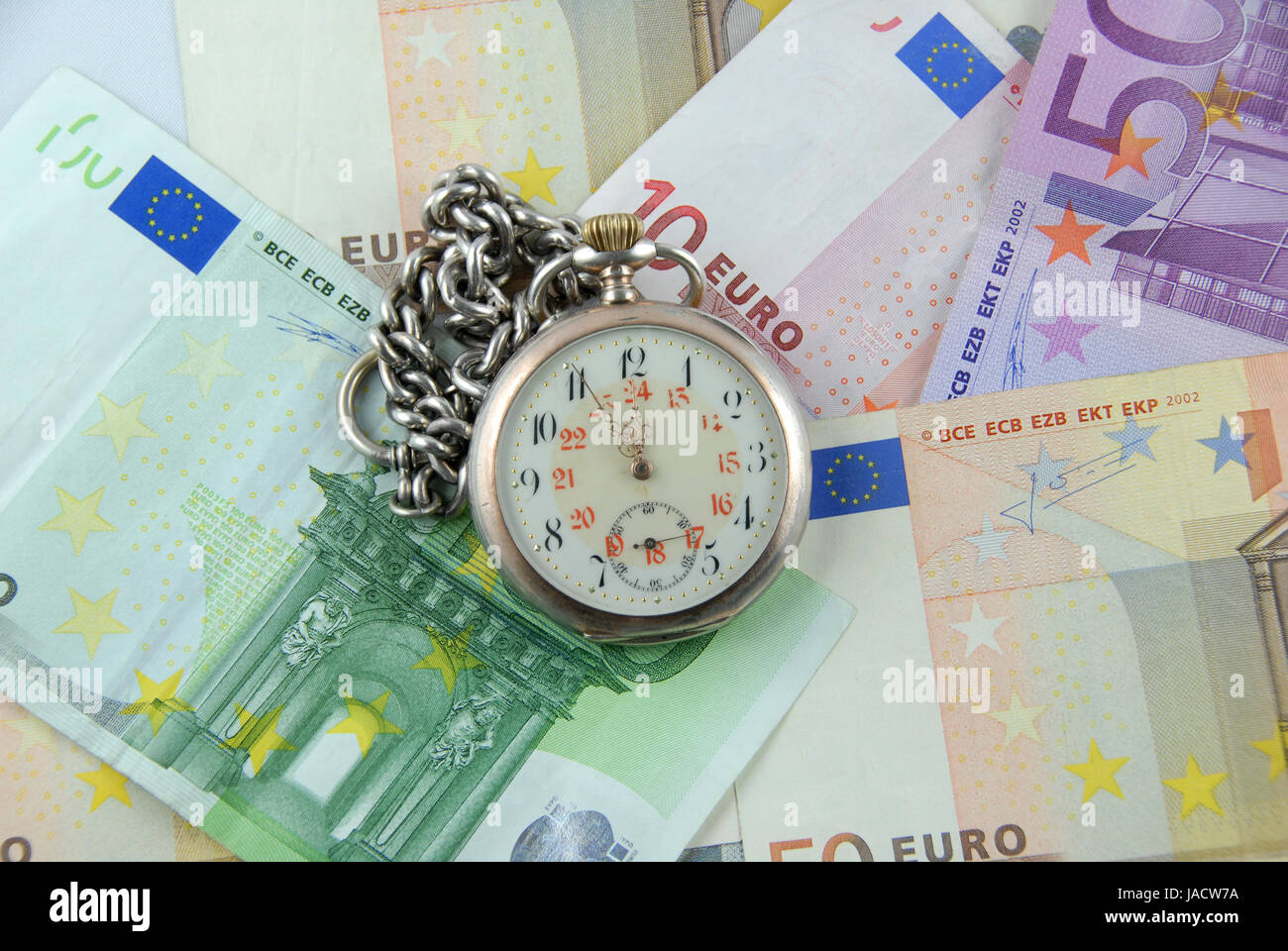 euro with pocket watch Stock Photo - Alamy