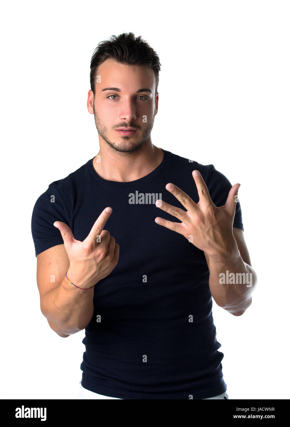 Attractive young man counting to seven with fingers and hands, isolated ...
