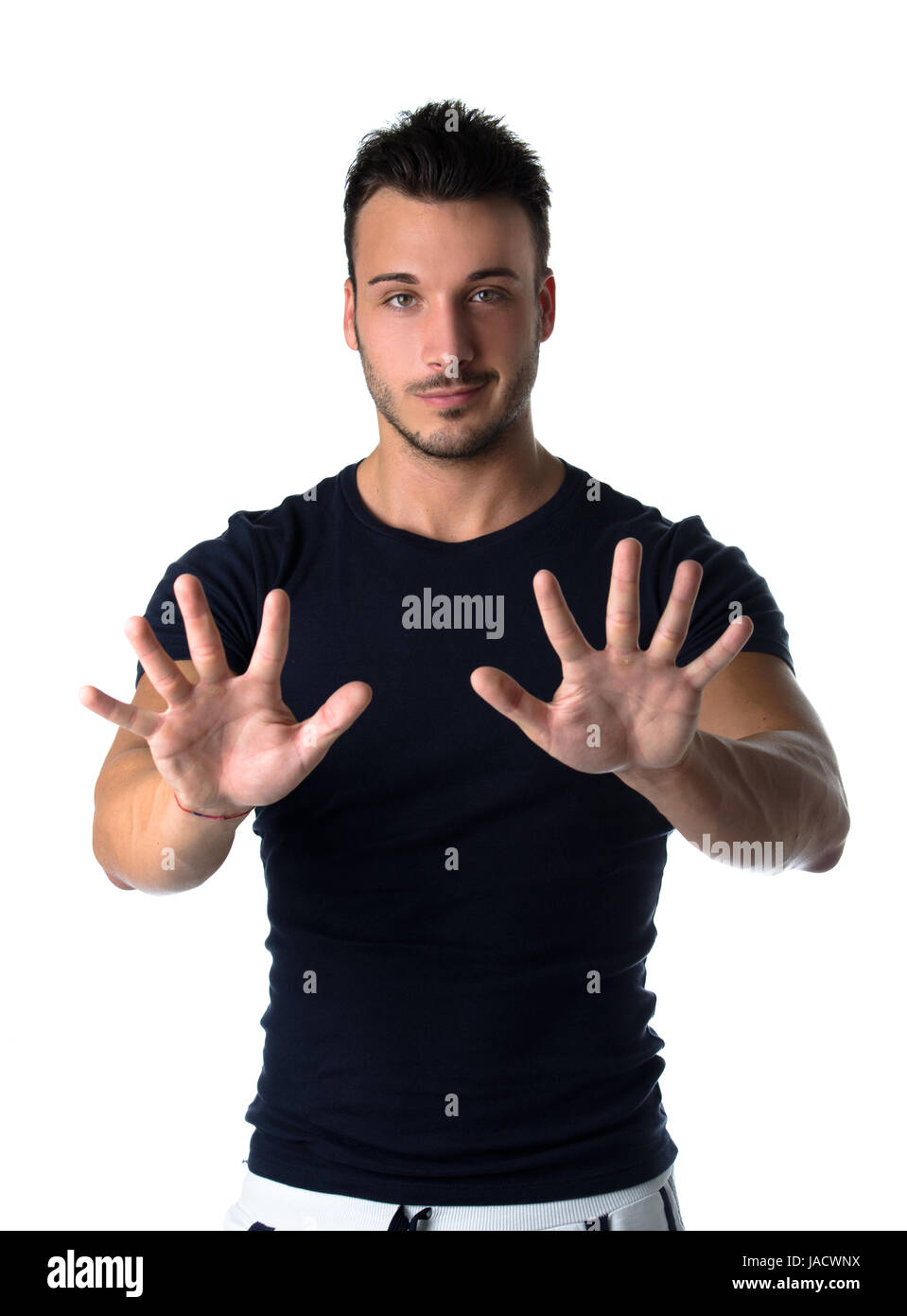 Attractive young man counting to ten with fingers and hands, isolated ...