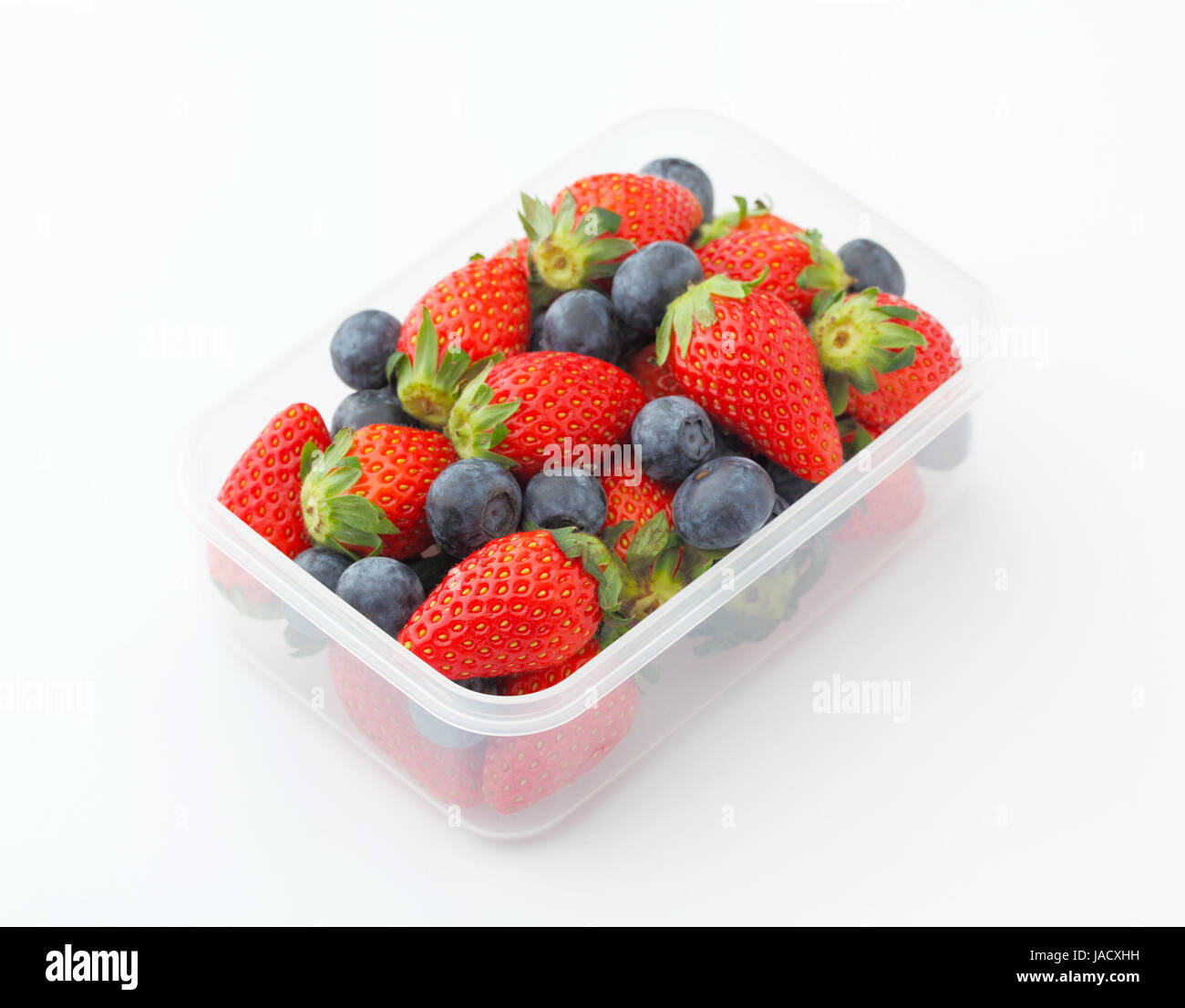Strawberry and blueberry mix in lunch box Stock Photo - Alamy