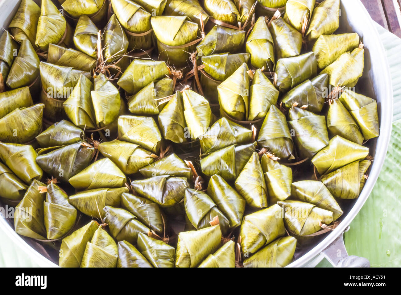 Khao tom mad is a Thai traditional dessert made from sticky rice ...