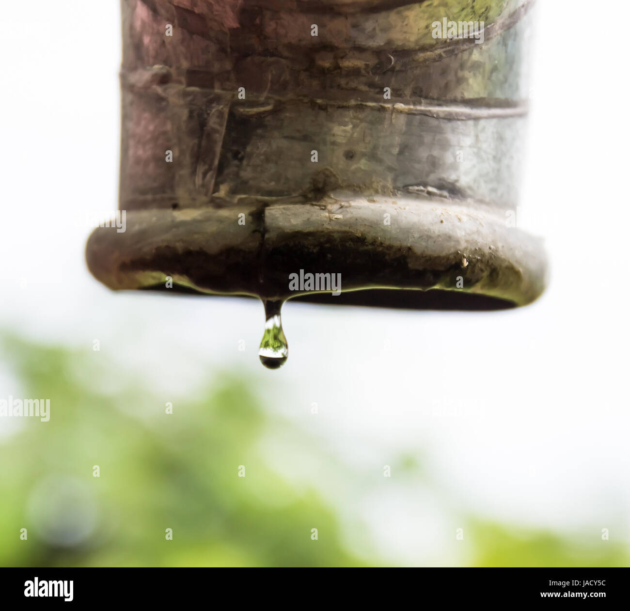 Water drips from a pipe Stock Photo - Alamy