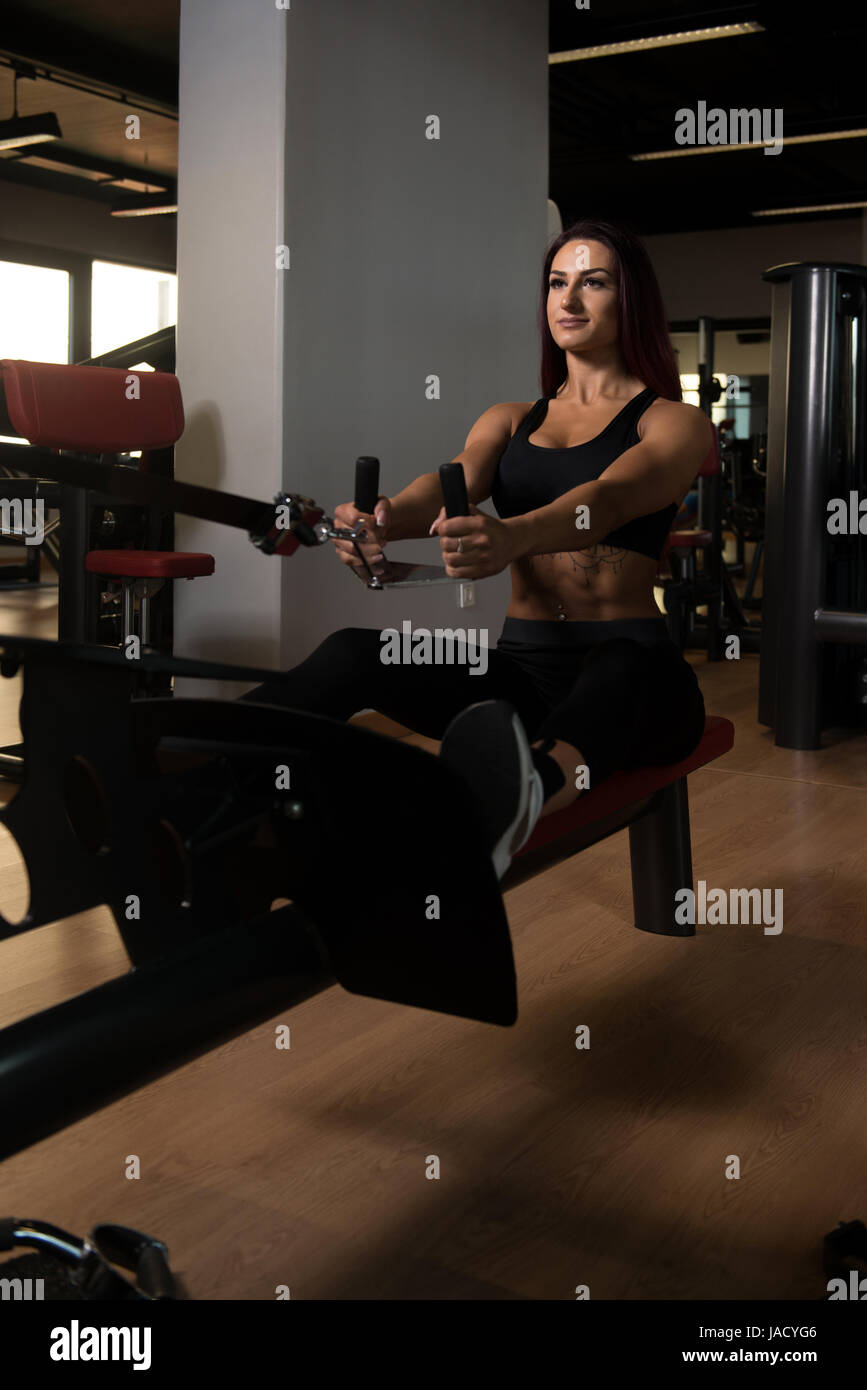 Muscular woman flexing hi-res stock photography and images - Alamy