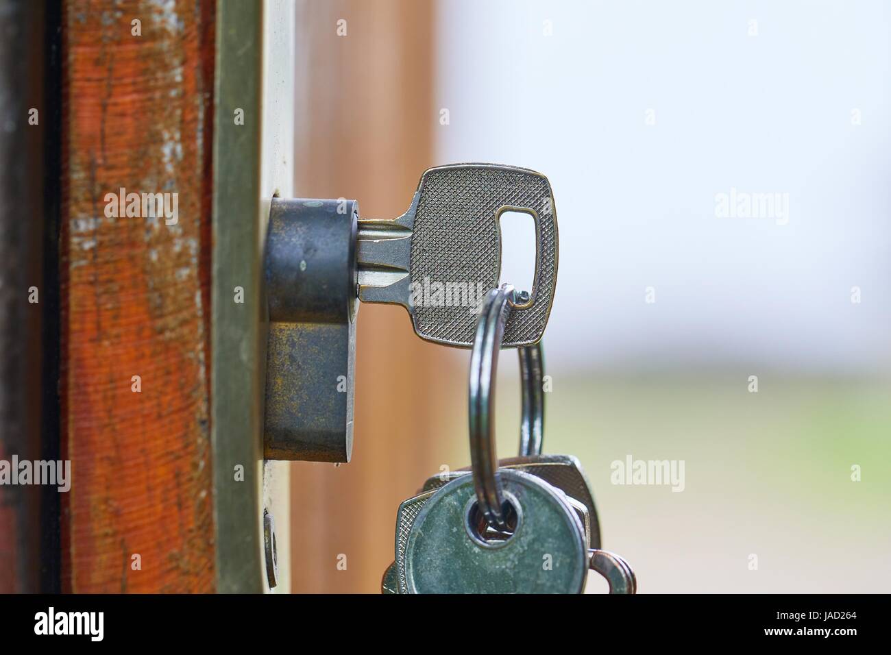 Open garden gate with key Stock Photo - Alamy