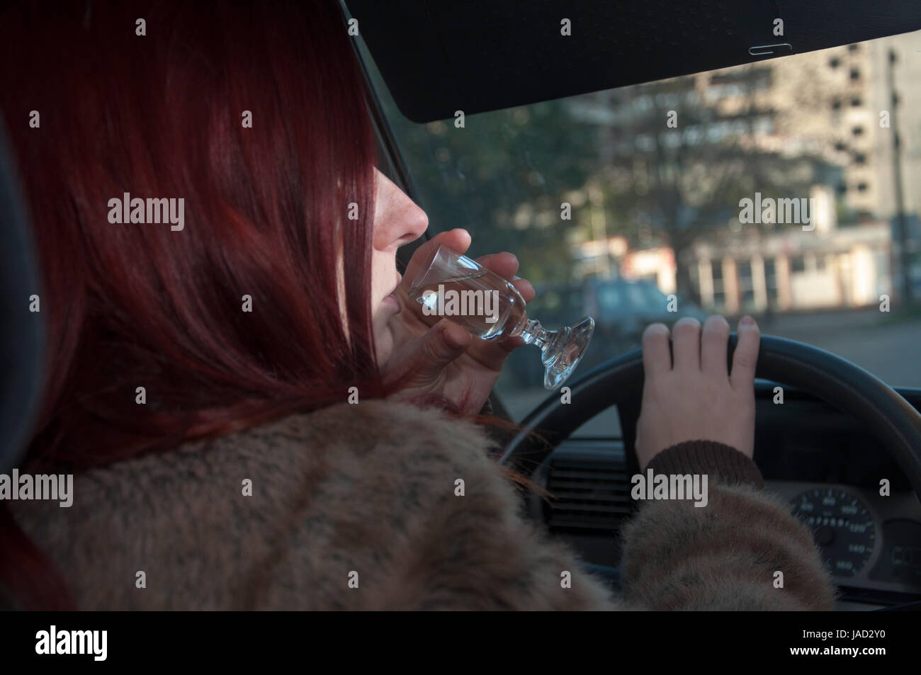 Drunk woman driving car vodka hi-res stock photography and images - Alamy
