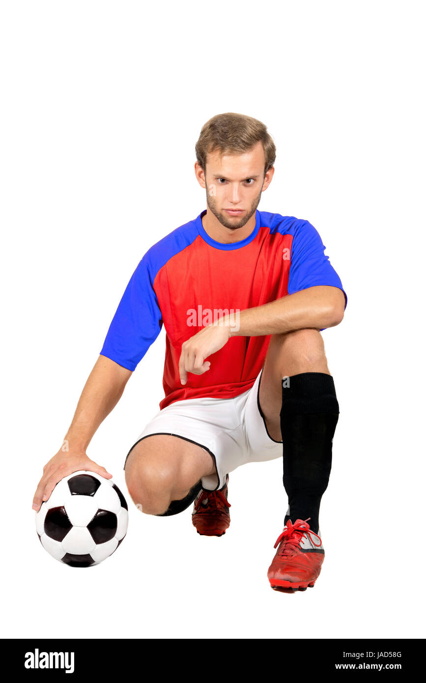 Football player with a ball isolated in white Stock Photo - Alamy