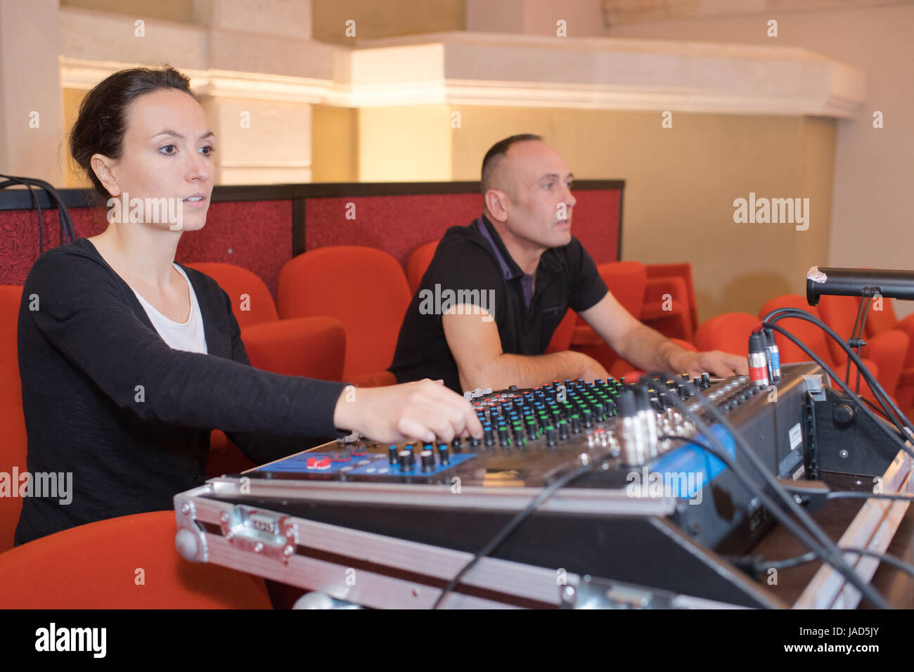 engineer working at mixing desk in recording studio Stock Photo - Alamy