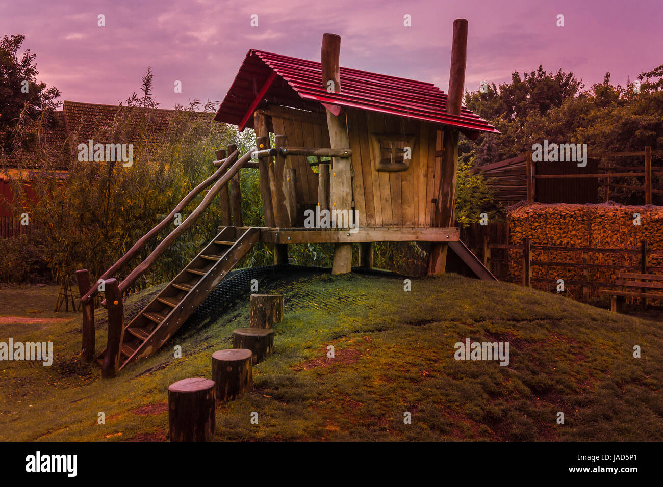 Spooky childrens wooden playhouse with steps and a slide slide Stock ...