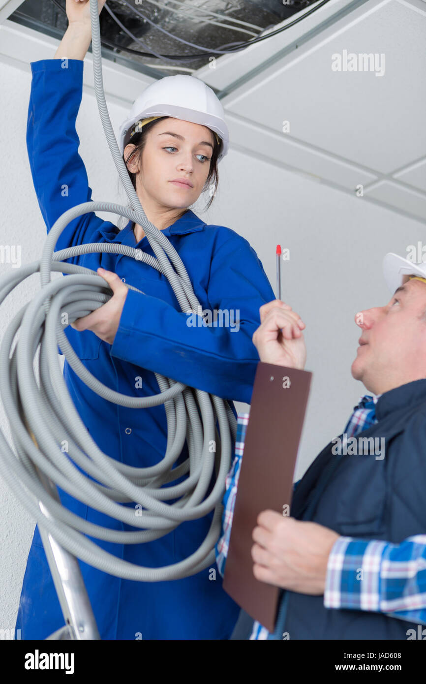 female electrician with cables Stock Photo - Alamy