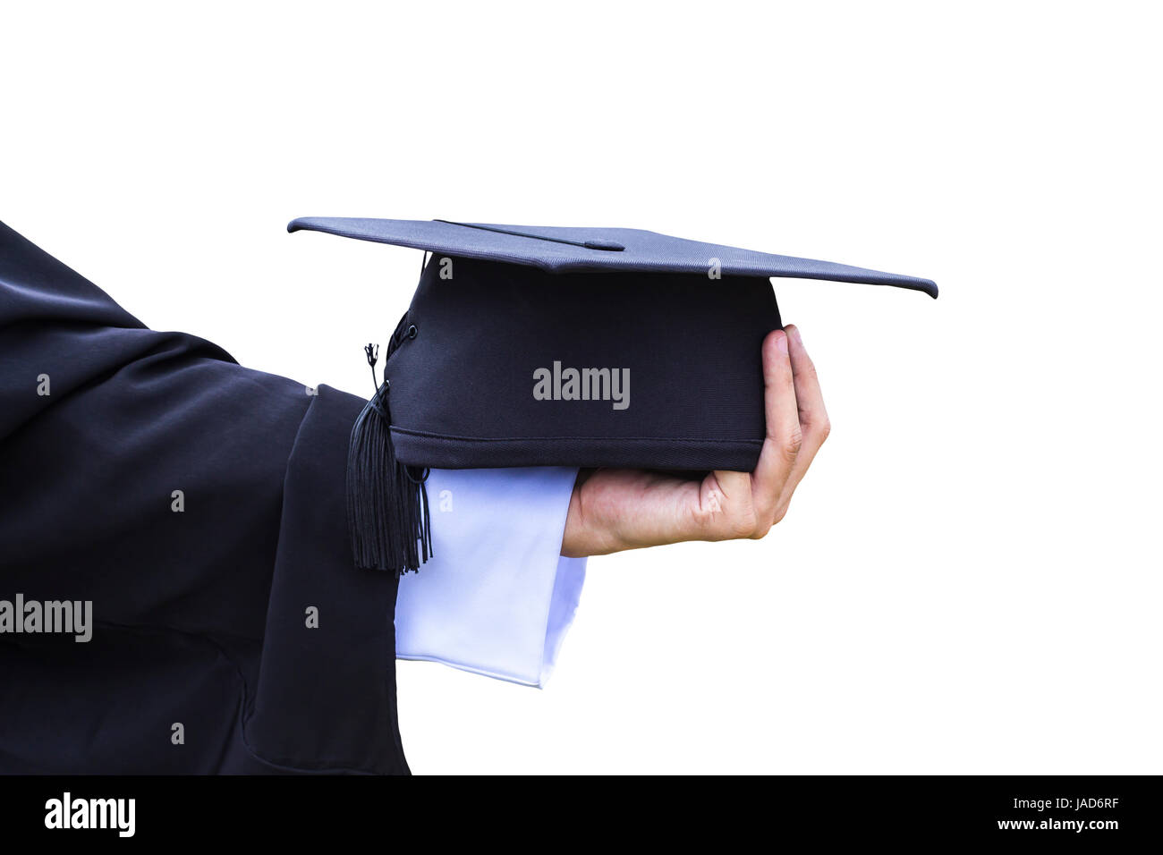 Graduation hat in hand isolated on white background Stock Photo - Alamy