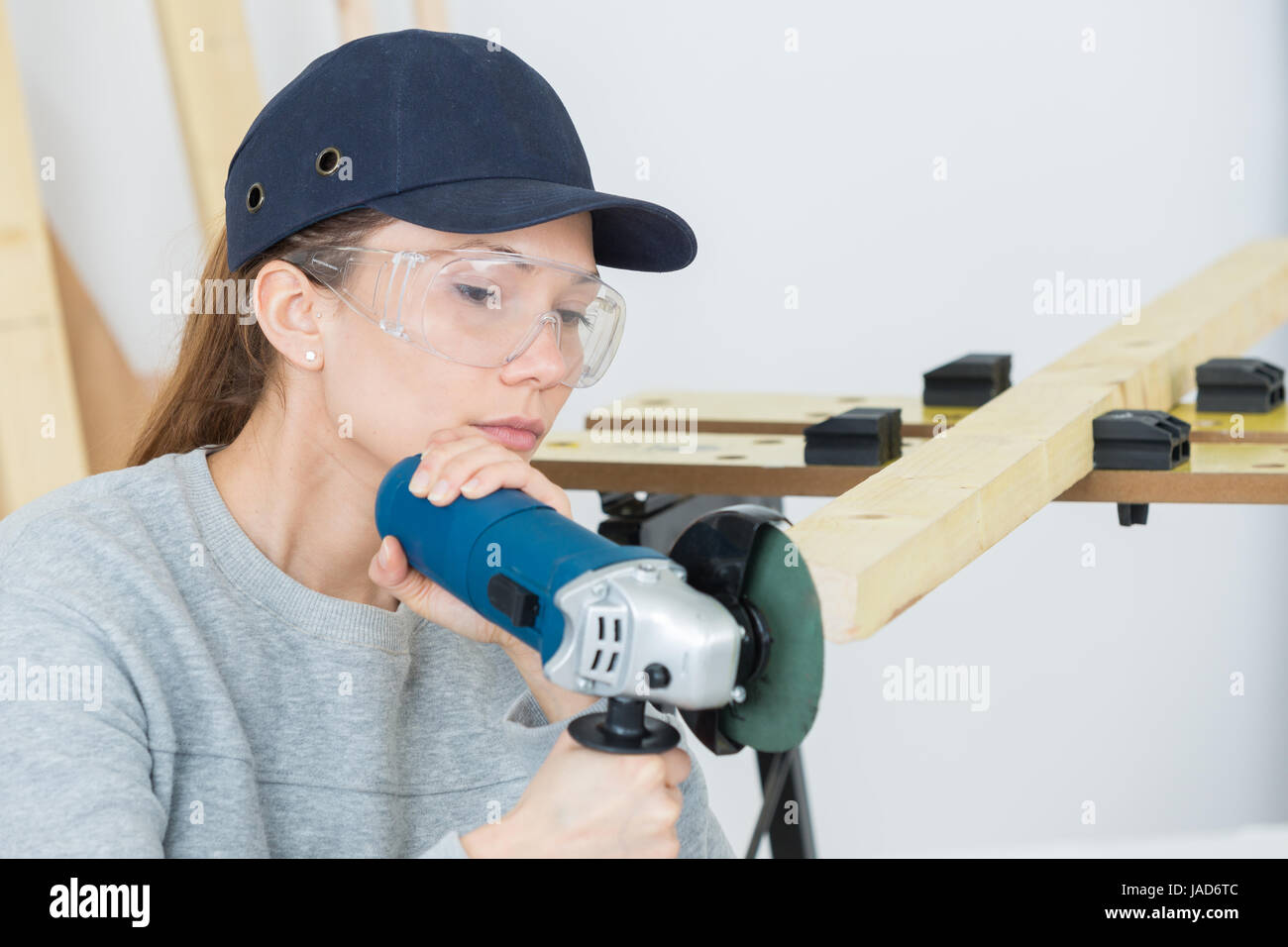 Woman using grinder hi-res stock photography and images - Alamy