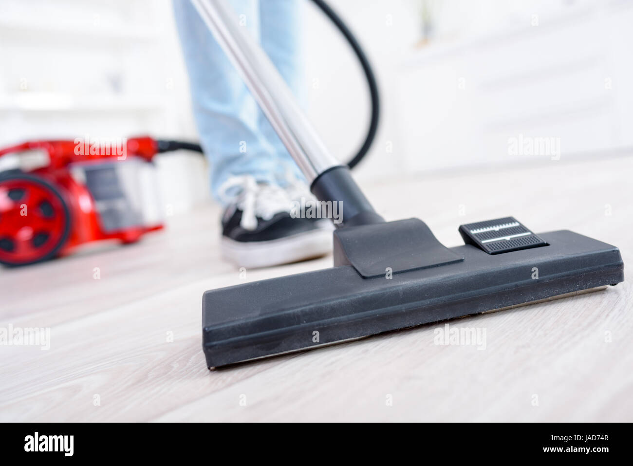 Person using vacuum cleaner hi-res stock photography and images - Alamy
